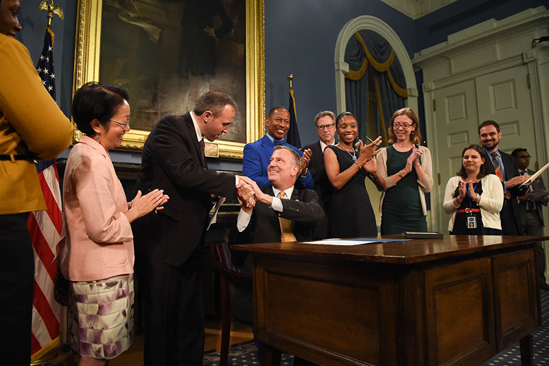 Mayor De Blasio Signs Legislation To Waive Building Fees For Build It